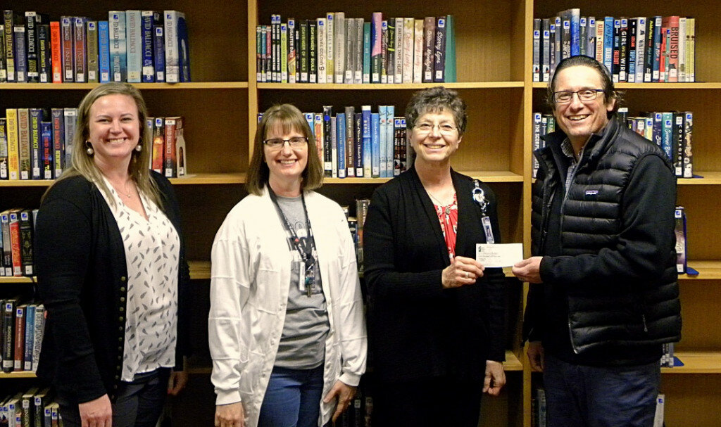 Altrusa makes donation for books - Brookings Register
